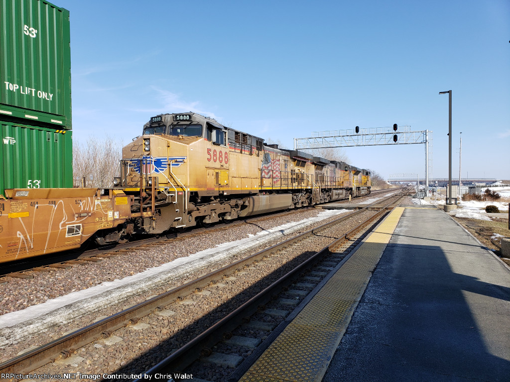 UP 5888 is trailing on a west bound stack train
